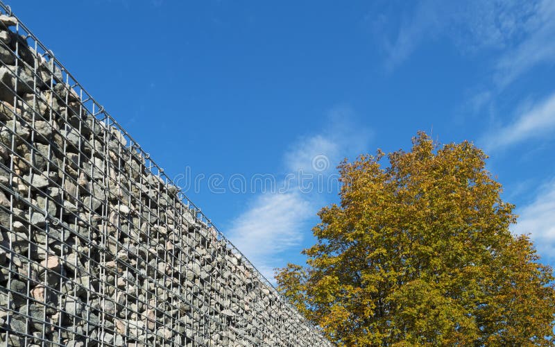Wall of steel and stones stock image. Image of wire, steel - 77841613