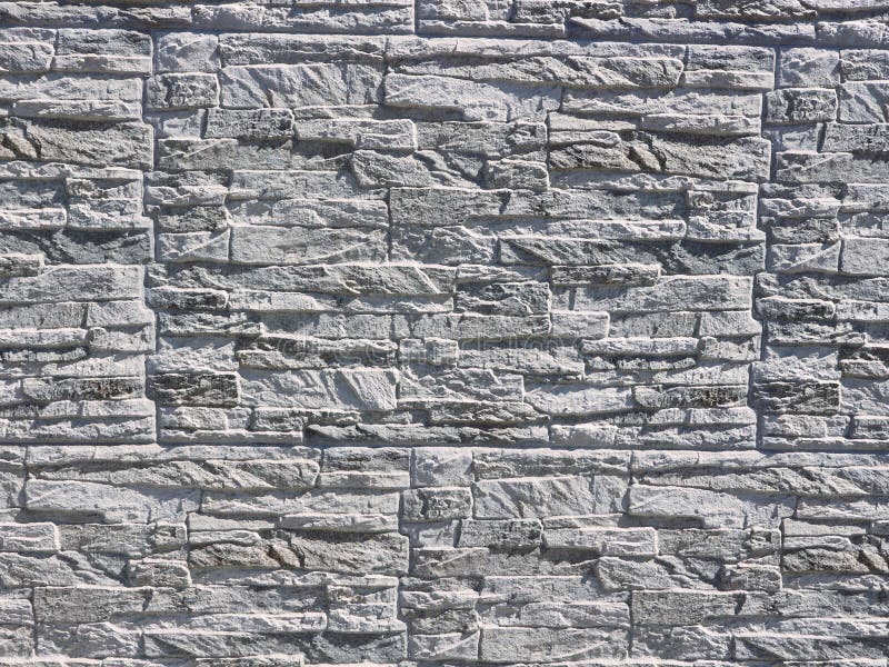 Stone Cladding Wall Made of Striped Stacked Slabs of Natural Rocks ...