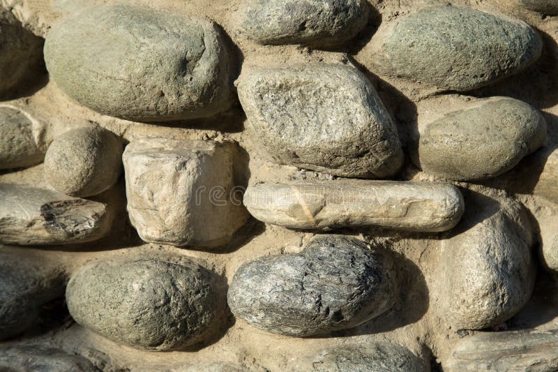 Wall of stones close up stock image. Image of cement - 133597635