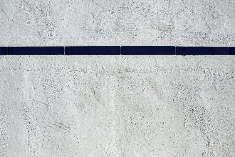 Wall with Strip of Blue Tiles Stock Photo - Image of rough, pattern ...