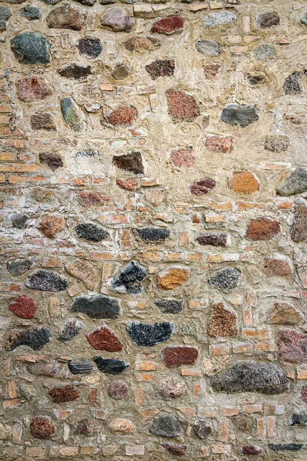 Wall Texture with Pieces of Old Bricks Mixed with Exposed Round Stones ...