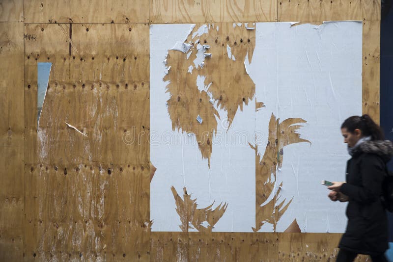 Wall Texture with Torn Posters Editorial Photo - Image of ripped ...