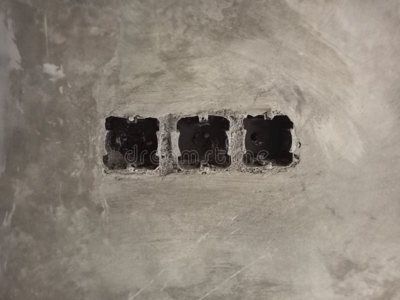 A Wall with Three Socket Switch Box Holes in it Stock Image - Image of ...