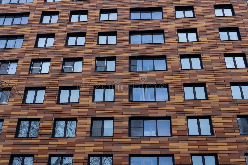 Wall of a Trendy Modern Building with Windows with an Abstract Brown ...