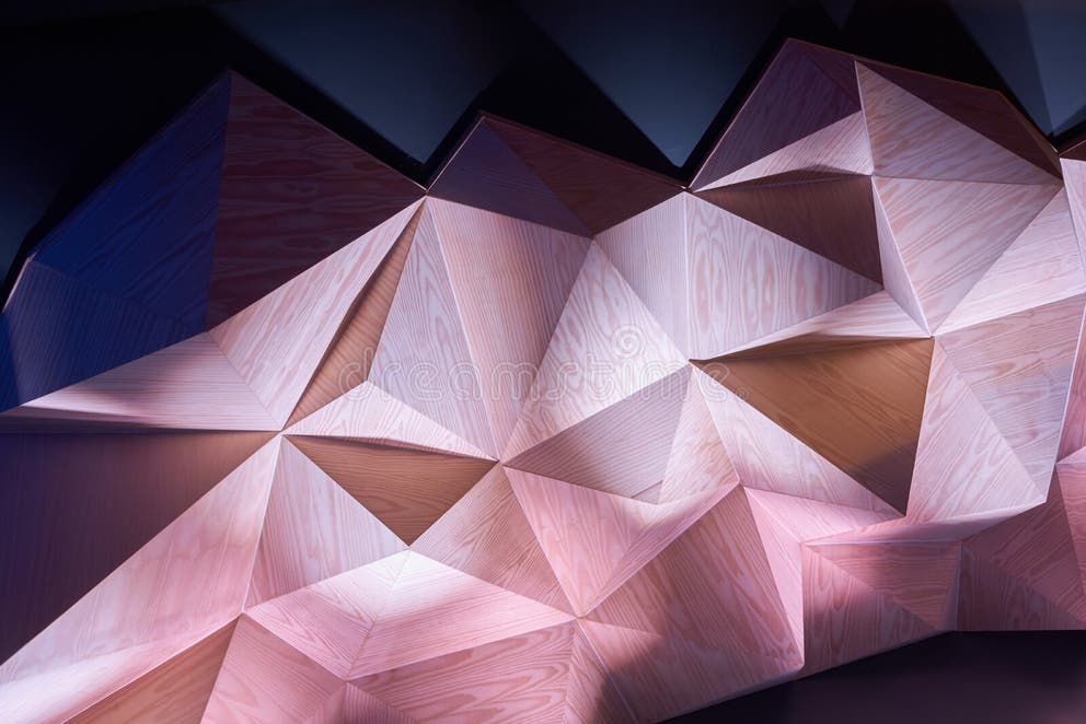 Wall with Triangular Textures Illuminated with Different Colors Stock ...