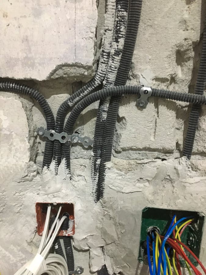 Unfinished Wall with Electrical Wiring and Conduits Installation Stock ...