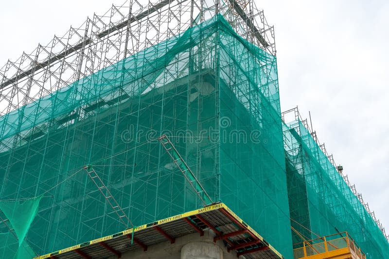 Construction Safety Net at Building Stock Photo - Image of protect ...