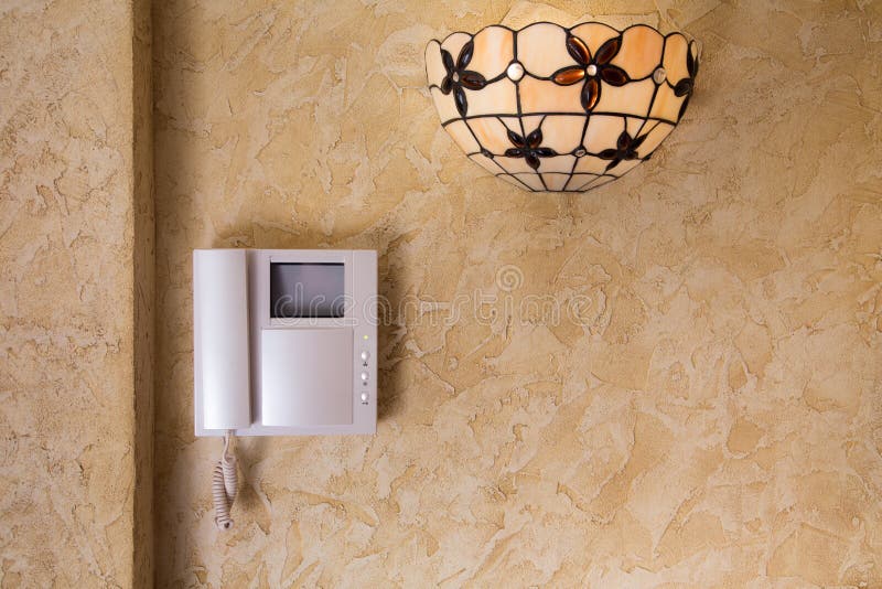 Wall with Video Intercom Equipment and Lamp Stock Image - Image of ...