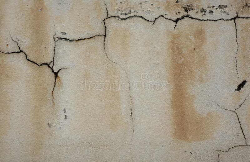 Wall with Visible Cracks and Peeling Paint Highlighting Wear and Tear ...