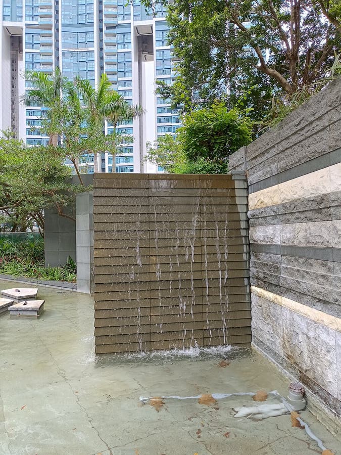 Wall of Waterfall Design in the City Stock Photo - Image of walkway ...