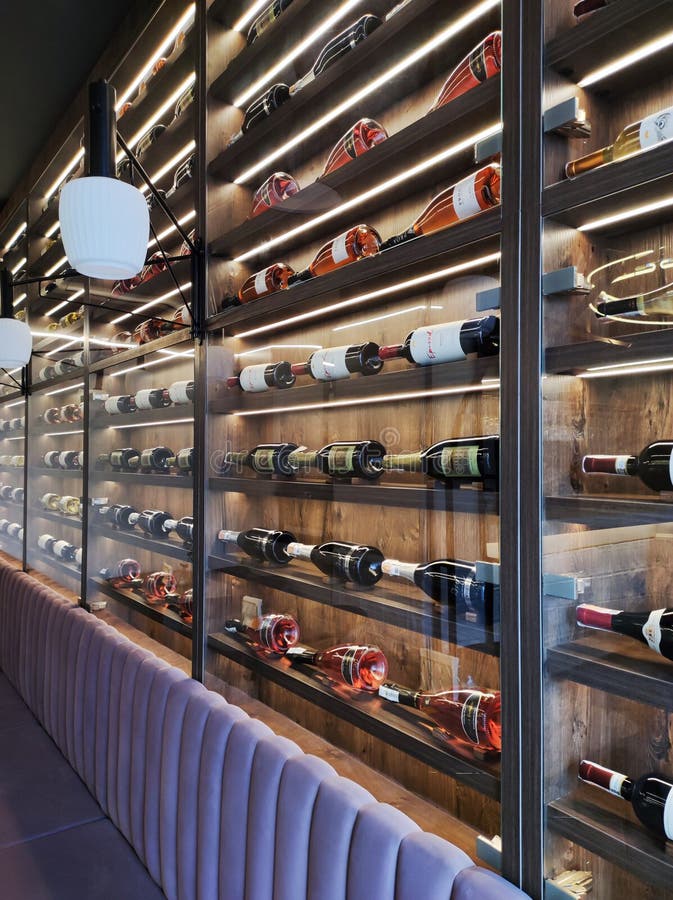 Wall of Wine Bottles Collection and Interior of Restaurant Editorial ...