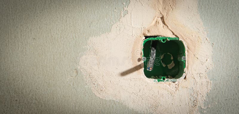 Wall with Wire in Socket Holes. Preparation before Installing Socket ...