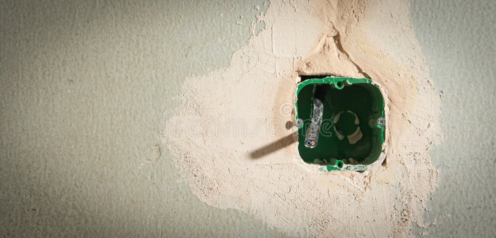 Wall with Wire in Socket Holes. Preparation before Installing Socket ...