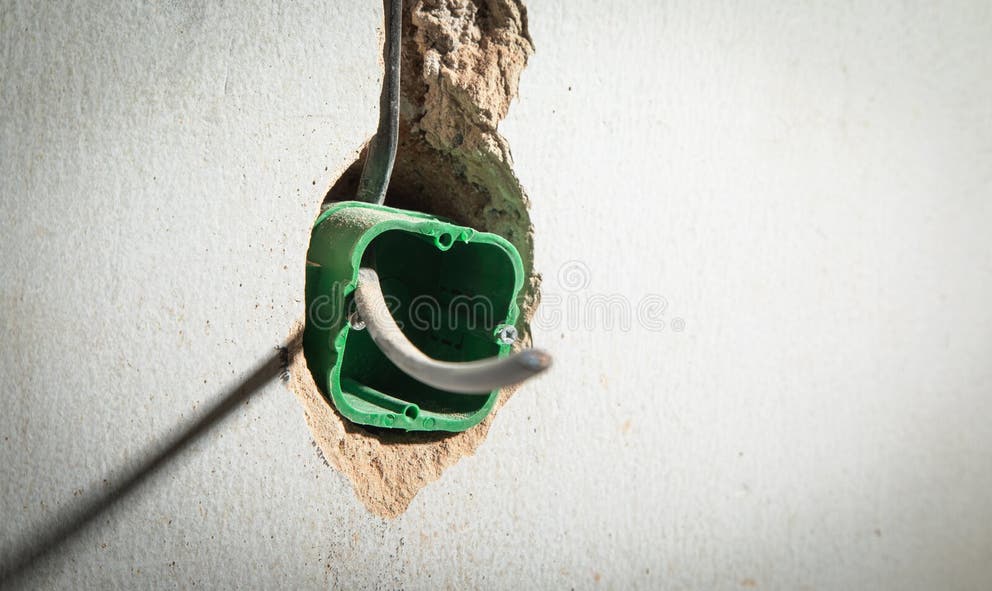 Wall with Wire in Socket Holes. Preparation before Installing Socket ...