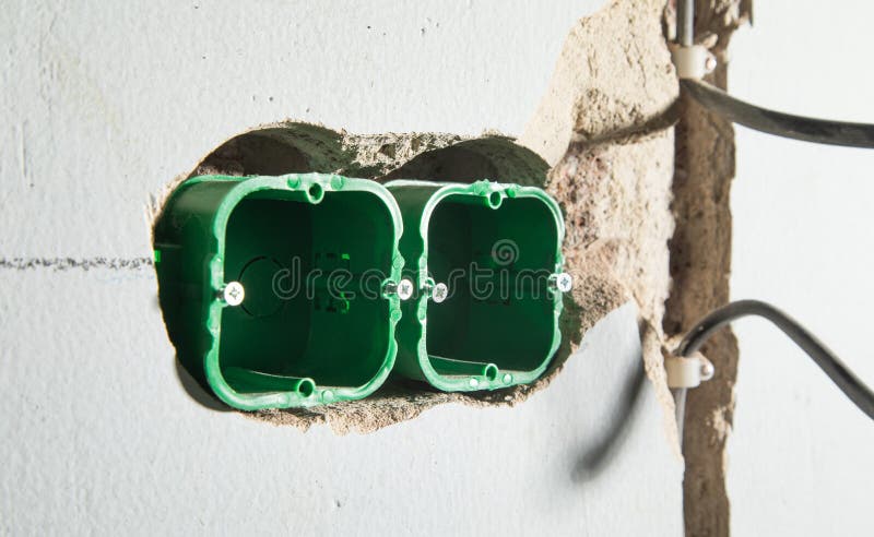 Wall with Wire in Socket Holes. Preparation before Installing Socket ...