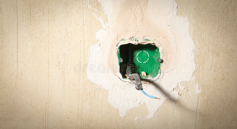 Wall with Wire in Socket Holes. Preparation before Installing Socket ...