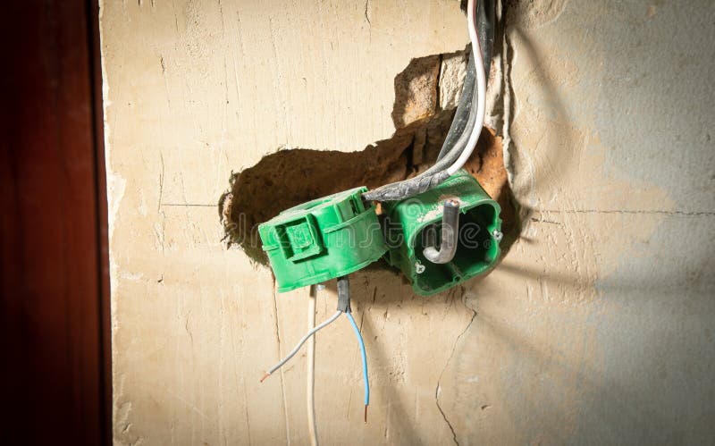 Wall with Wire in Socket Holes. Preparation before Installing Socket ...
