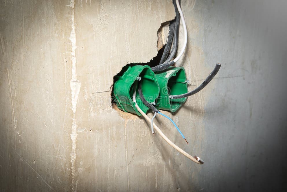 Wall with Wire in Socket Holes. Preparation before Installing Socket ...