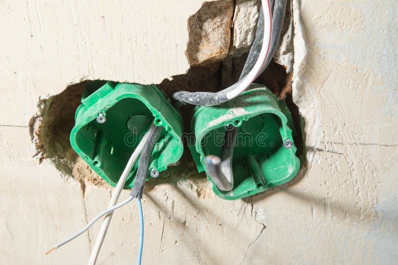 Wall with Wire in Socket Holes. Preparation before Installing Socket ...