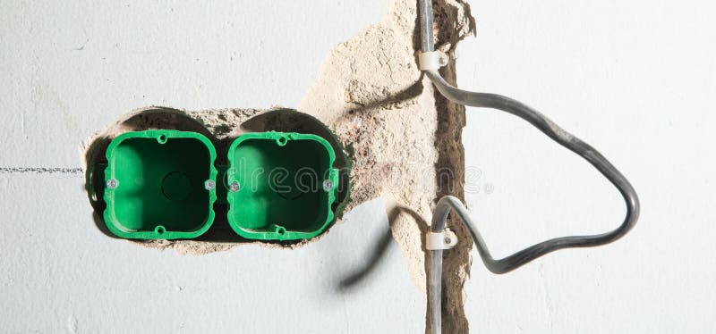 Wall with Wire in Socket Holes. Preparation before Installing Socket ...