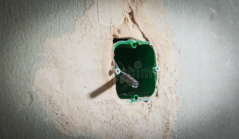 Wall with Wire in Socket Holes. Preparation before Installing Socket ...