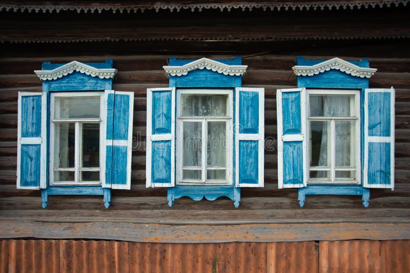 Wall of Wooden Traditional Russian House with Windows and Carved Frames ...