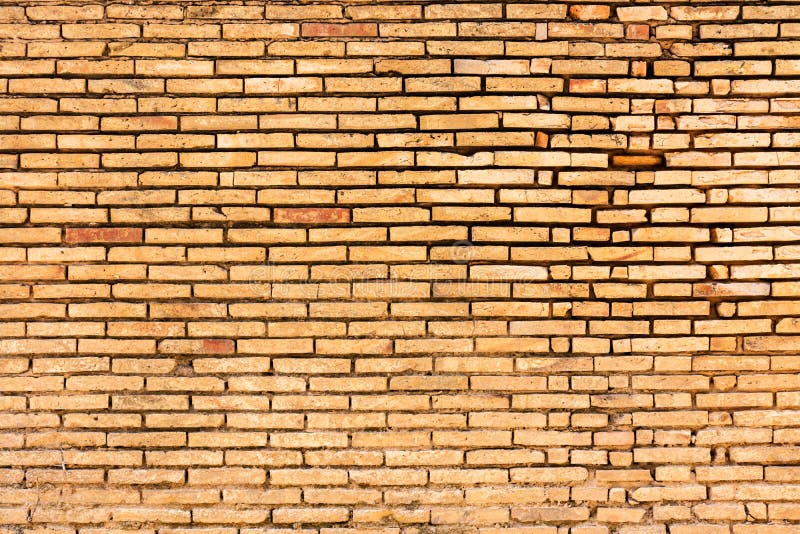 Wall of yellow bricks stock image. Image of outside - 191337265