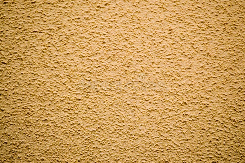 Wall of Yellow Rough Embossed Building Decorative Stucco. Texture ...