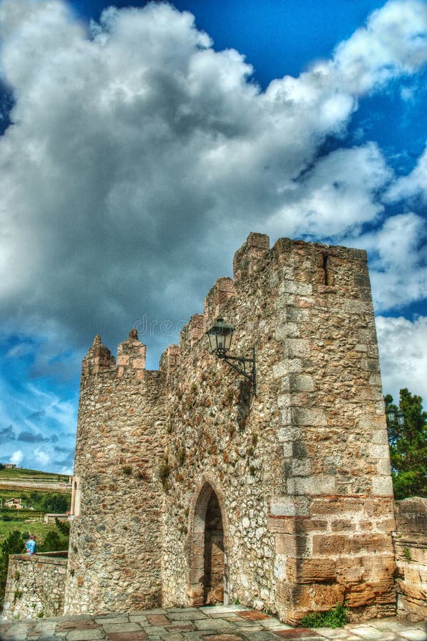 Walled Tower Entrance To the Castle with Blue Sky in the Background ...