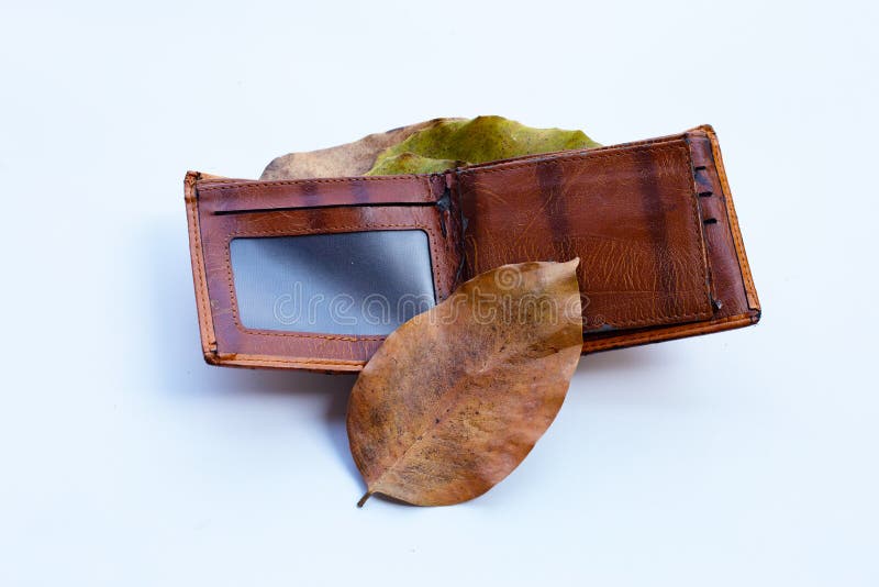 Wallet with Dry Leaves on White Background. Poor or No Money Concept ...