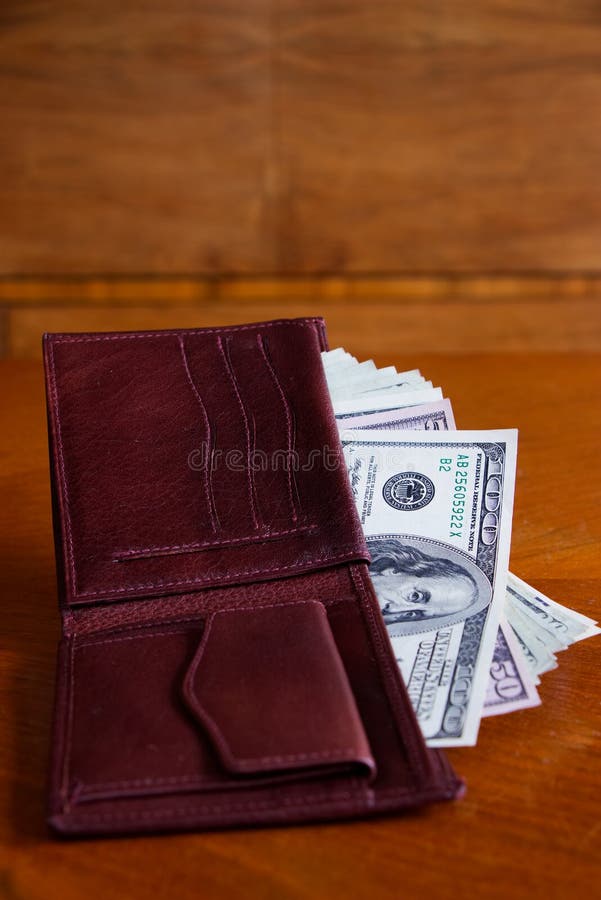 Wallet Full of Dollar Bills Stock Image - Image of paper, financial ...