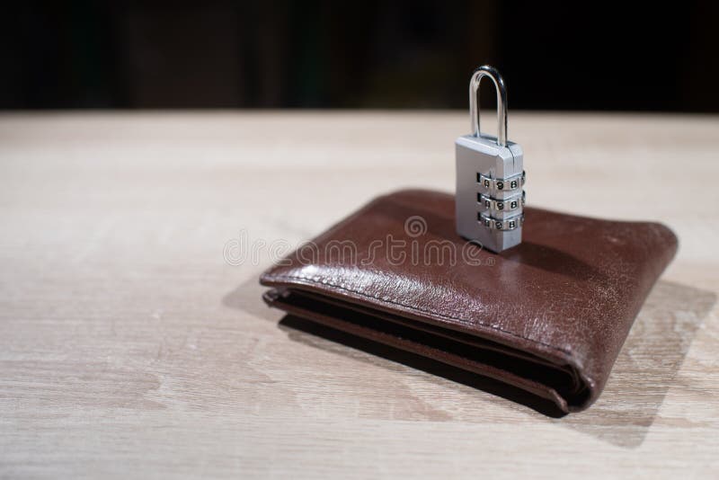 Wallet with Lock Padlock on Table Stock Photo - Image of bill, phone ...