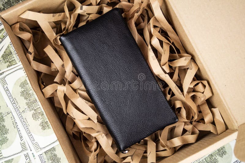 Wallet Made of Genuine Leather on the Table in the Process of Packing a ...