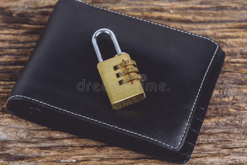 Wallet With Metal Security Lock With Pass-code Or Password On Wooden ...