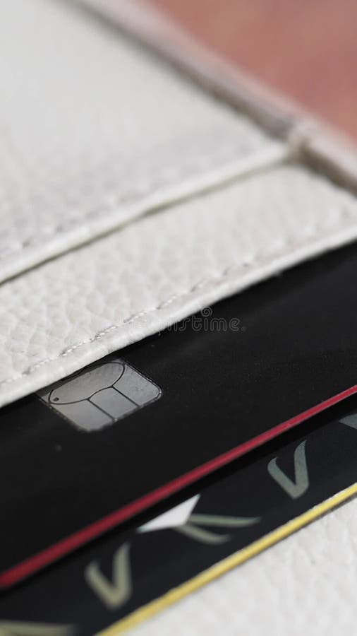 Wallet with Multiple Cards Showcased on a Textured Surface Stock Video ...
