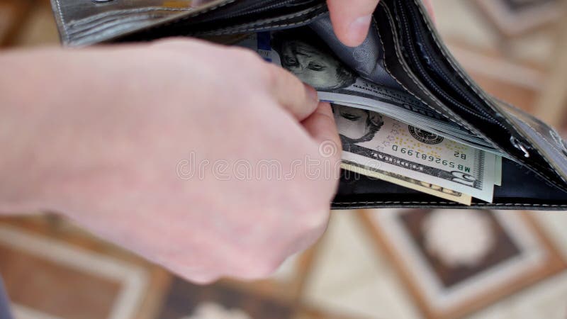Wallet with US Dollars Inside Stock Image - Image of male, cpunting ...