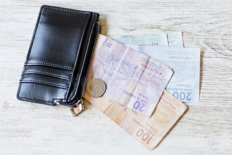 Wallet on a Wad of Moroccan Dirham Bills. Stock Image - Image of ...