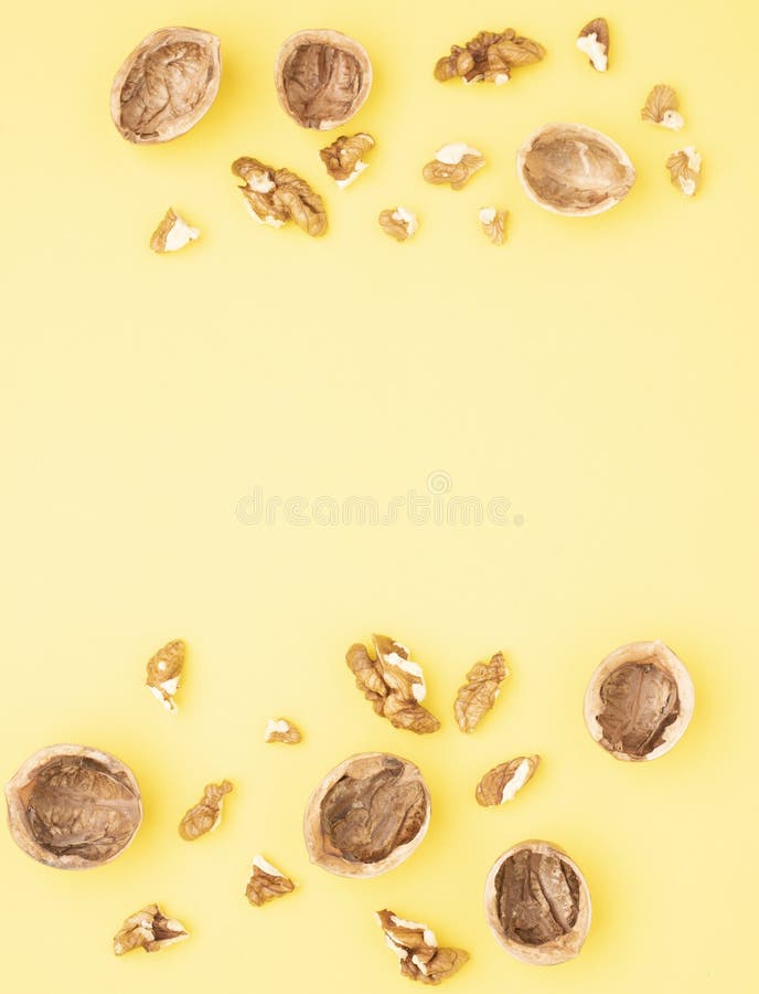 Wallnut Seeds on Yellow Table, Top View and Copy Space Stock Photo ...