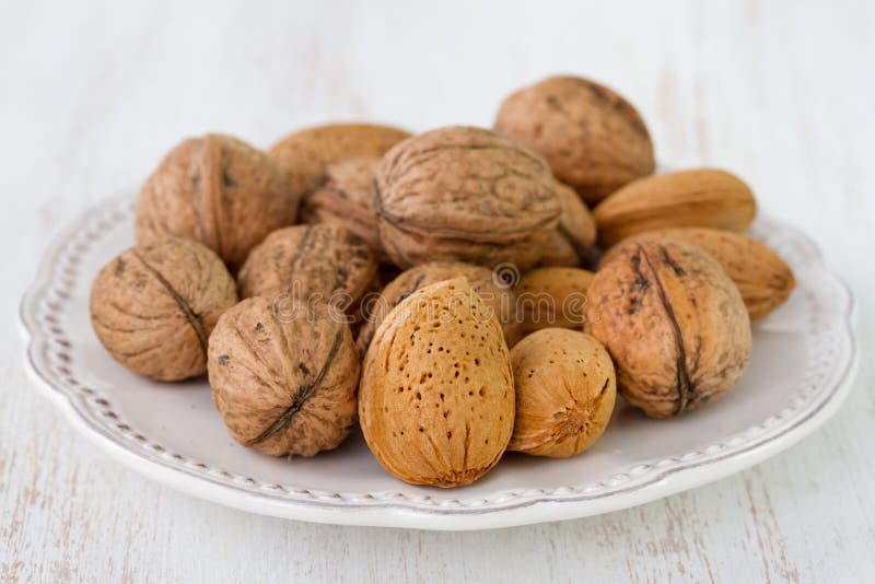 Walnut with almond stock photo. Image of uncooked, brown - 30505244
