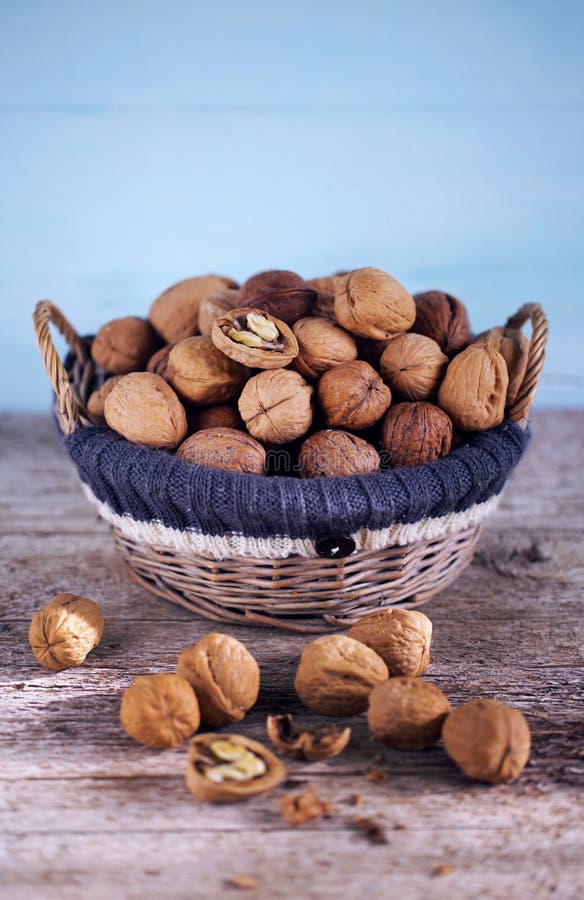 Walnut Basket Full of Whole Nuts in Shells and Some Broken Stock Photo ...