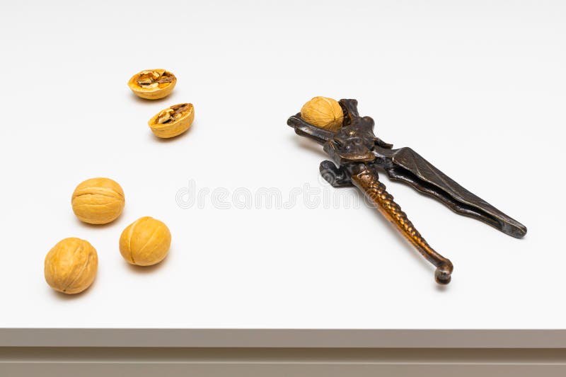 Walnut Cracker Photographed Against a White Background. Stock Photo ...