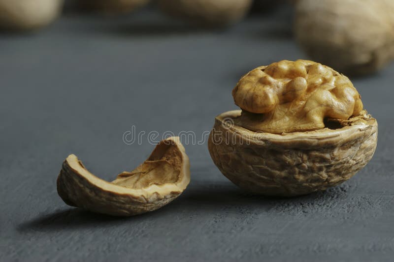 Walnut Kernel with Shell on Wooden Backdrop. Healthy Food for Brain ...