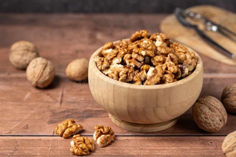 Walnut Kernel in a Wooden Bowl. Shelled, Dried Seeds of Walnuts in ...
