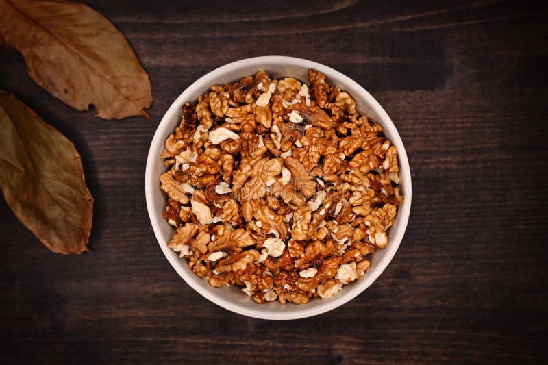 Walnut Kernels in a Bowl on a Rustic Table Stock Image - Image of ...