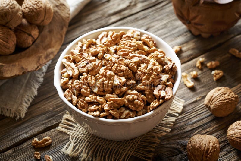Walnut Kernels in a Bowl on a Rustic Table Stock Image - Image of ...