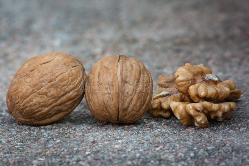 Walnut Kernels and Whole Walnuts Stock Photo - Image of nutrient ...