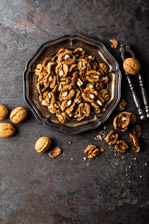 Walnut Kernels in a Bowl on a Rustic Table Stock Image - Image of ...