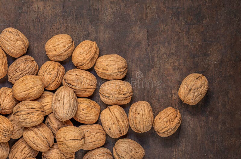 Walnut. Peeled Walnut Kernel Nut on Wooden Background. Top View. Flat ...