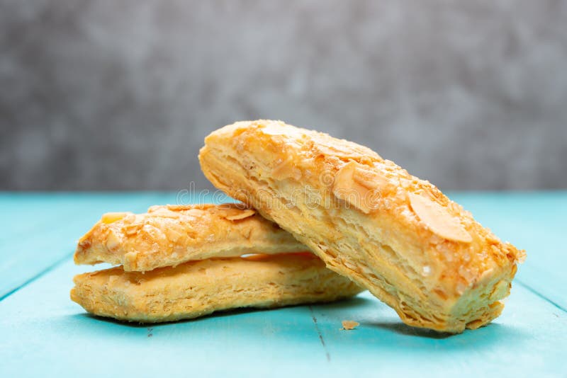 Walnut Puff Pastry on Blue Table Stock Image - Image of baked, pastry ...