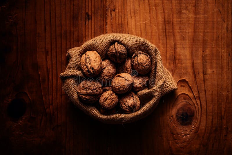 Walnut Shell Heap in Eco Friendly Burlap Sack Stock Photo - Image of ...